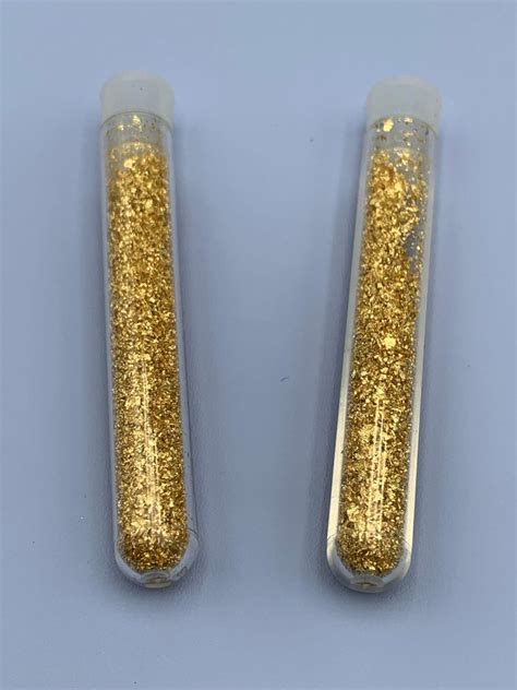 Lot Of 2 Large Vials Of Golden Flaking Material