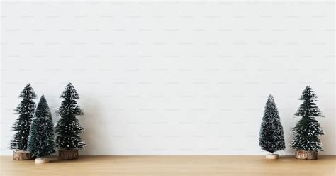 디자인 공간 배경이 있는 크리스마스 트리 사진 Unsplash의 계절 이미지