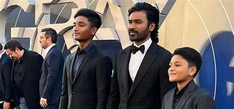 Dhanush Suits Up And Attends The Gray Man Premiere With Sons Yatra