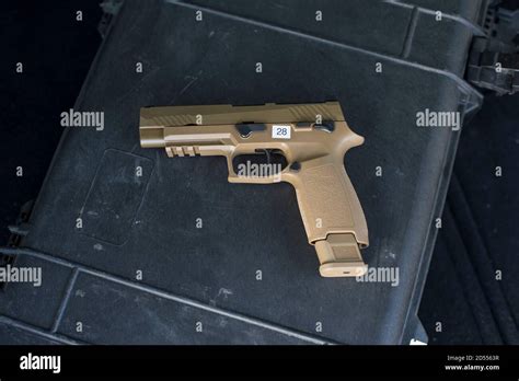 A Sig M Pistol At The Firing Range On Camp Swift The Sig M Is Replacing The Older Beretta