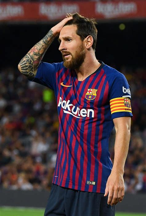 Download Messi Reflective Moment Barcelona Uniform Wallpaper