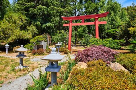 Premium Photo Welcoming Torii Gate In Japanese Garden With Stone