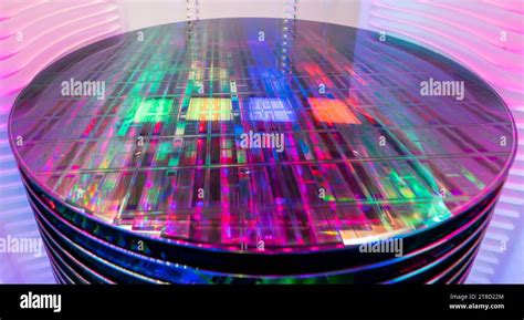 Patterned Silicon Wafers In A Universal Pod Electronic Circuit Designs Have Been Built Onto The