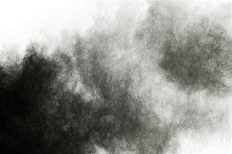 白い背景の白い背景の黒色火薬爆発や黒色火薬を投げの凍結の動きの上で抽象的な粉崩れた上炭の粒子 いっぱいになるのストックフォトや画像を多数ご