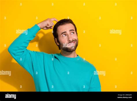 Photo Of Funny Guy Scratch Finger Head Look Empty Space Choose Best