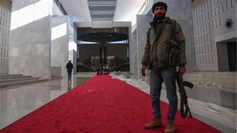 Opposition Fighters Seize Al Assad Presidential Palace In Syrias