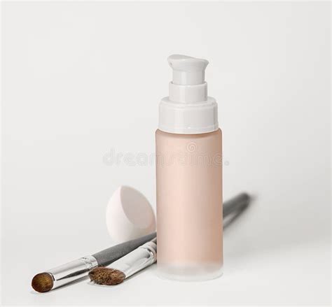 Elegant Makeup Essentials That Include Foundation Bottle With A Pump Sponge Brushes For Your
