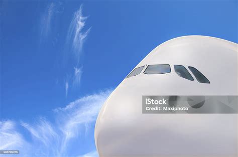 Jet Airplane Cockpit View From Outside White Fuselage Blue Sky Stock