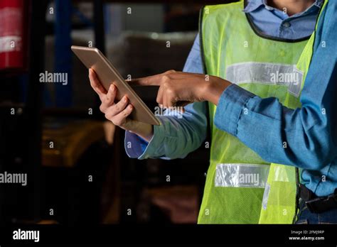 Female Warehouse Worker Working At The Storehouse Logistics Supply Chain And Warehouse