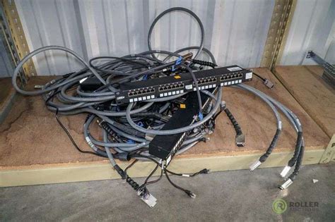 Shelf Of Amp Net Connect Cables And Switches Roller Auctions