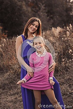 Lifestyle Capture Of Happy Mother And Preteen Daughter Having Fun