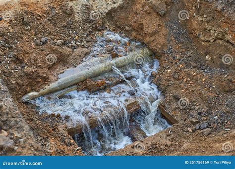 A Burst Water Pipe On The Street Stock Image Image Of Problem Leaky 251756169