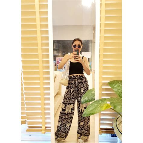 กางเกงลายช้าง กางเกงขายาวผู้หญิงฟรีไซส์ กางเกงใส่ไปทะเลกางเกงสาวอวบรุ่นขาปล่อย 300bath Thaipick