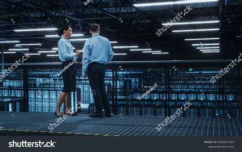 Data Center Female System Administrator Male Stock Photo 2052013043 Shutterstock