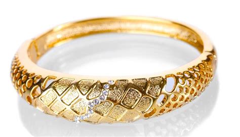 Premium Photo Beautiful Golden Bracelet With Precious Stones Isolated