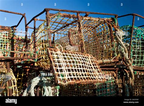 Pile Of Old Crab Fishing Pots On The Waterfront Of Fishing Port Stock