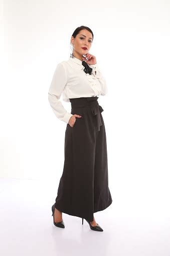 Young Beautiful Business Woman In Black Skirt White Shirt And Glasses