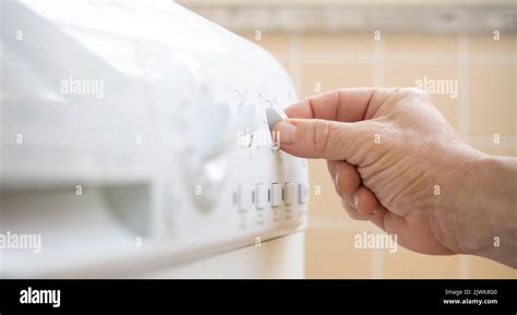 Household Appliance Saving Energy Human Hand Tuning Knob On Machine