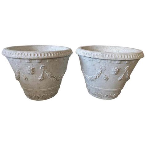 Pair Of Vintage Concrete Planters With Large Shell Decoration At