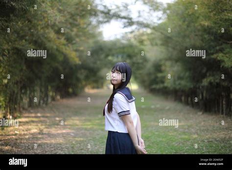 Portrait Of Beautiful Asian Japanese High School Girl Uniform Looking