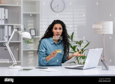 Professional Hispanic Woman Facing A Problem While Working On Her