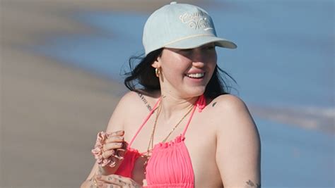 Noah Cyrus Hits Miami Beach In Peach Colored Bikini Photos