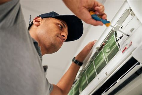 Premium Photo Maintenance Air Conditioner And Man With Screwdriver For Problem Solving On