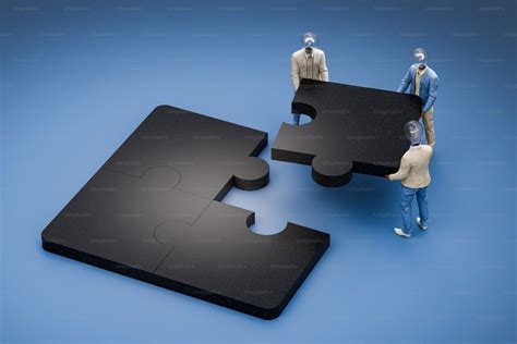 퍼즐 조각 옆에 서 있는 두 개의 인형 사진 Unsplash의 성취 이미지