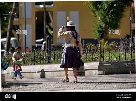 An Indigenous Cholita Aymaran Woman Dressed Traditionally And