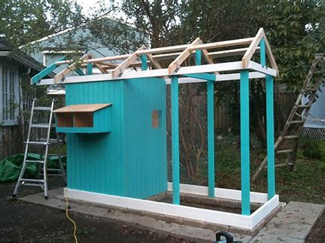 The Blue Between Three Wood Walls And Two Wire Walls