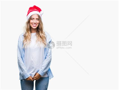 美丽的年轻金发女郎戴着圣诞帽高清图片下载 正版图片505541720 摄图网