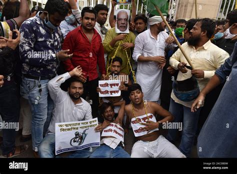 Congress Members Protests In Front Of Raj Bhavan Holding Some Posters