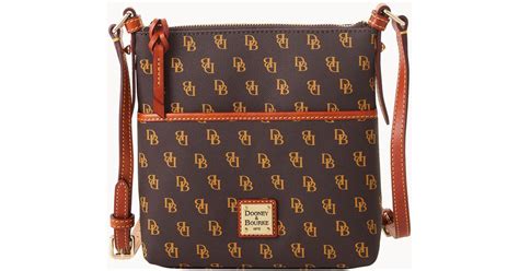 Dooney Bourke Canvas Gretta Letter Carrier In Brown Lyst