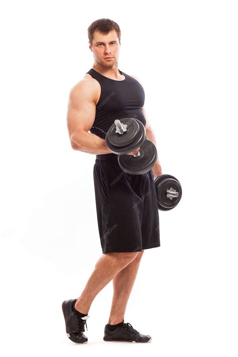 Красивый мускулистый парень работает Бесплатно Фото