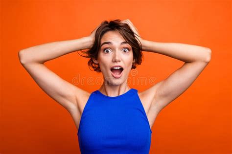 Photo Of Impressed Funky Lady Wear Blue Singlet Arms Head Open Mouth
