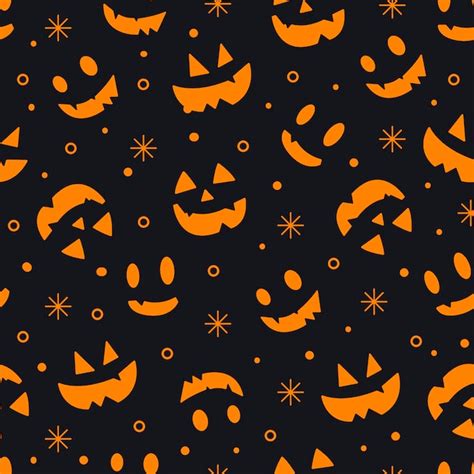 黒の背景にハロウィーンのカボチャの感情のシームレスなパターンハロウィーンのパターン プレミアムベクター
