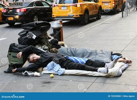 Homeless Couple In Public Transport Sleeping Editorial Photo