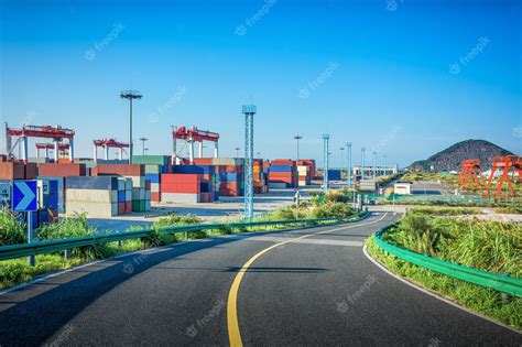 Premium Photo Container Loading In A Cargo Freight Ship With Industrial Crane Container Ship