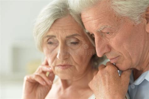 Portrait Of Sad Senior Couple Posing At Home Stock Image Image Of