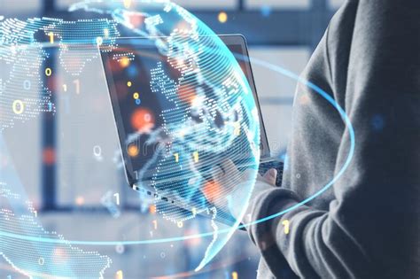 Close Up Of Hands Using Laptop With Glowing Planet And Binary Code