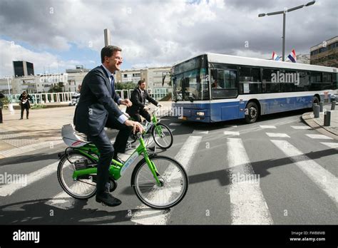 Prime Minister Of The Netherlands Mark Rutte Rides A Bicycle During A