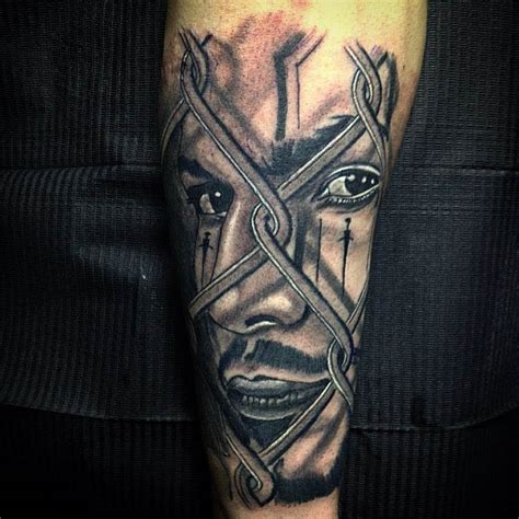 Chicano Face Tattoo On Arm Best Tattoo Ideas Gallery
