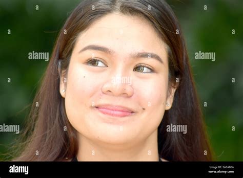 A Youthful Asian Adult Female Looking Stock Photo Alamy