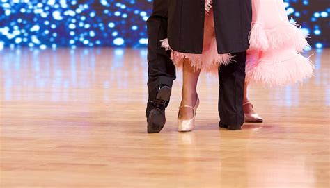 Premium Photo Low Section Of Man And Woman Dancing On Hardwood Floor