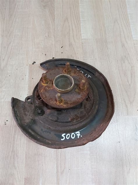 Toyota Corolla E12 tarcza kotwiczna 2 0 lewy tył 12731500321