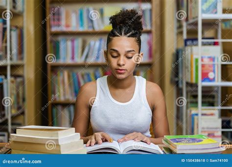 Black African American Young Girl Student Studying At The School