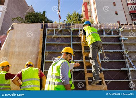 Workers At Assembly Workshop At Industrial Plant Editorial Image