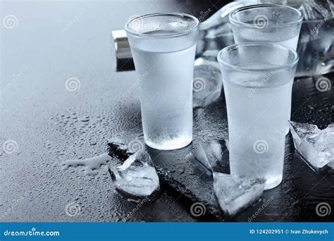 Vodka Shots Glasses With Vodka With Ice Dark Stone Backgroundcopy