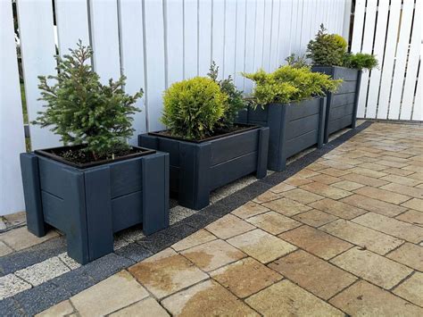 Деревянное кашпо для туи 74 фото