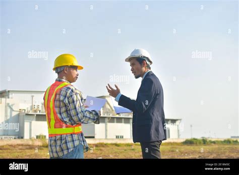 Project Manager Taking With Engineer Construction Plan Project Building Factory Construction